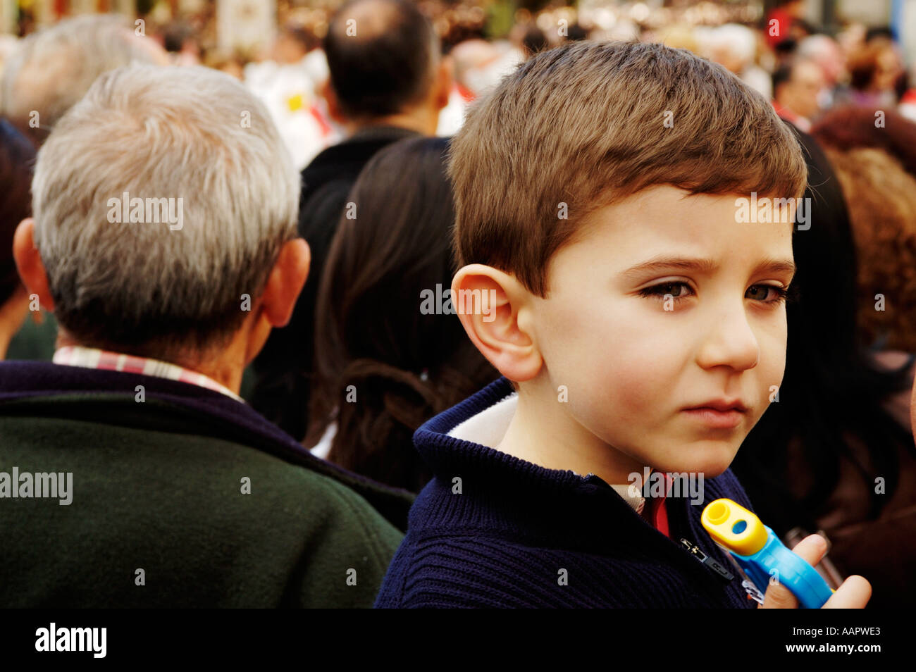Spain Madrid Young boy in crowd Stock Photo - Alamy