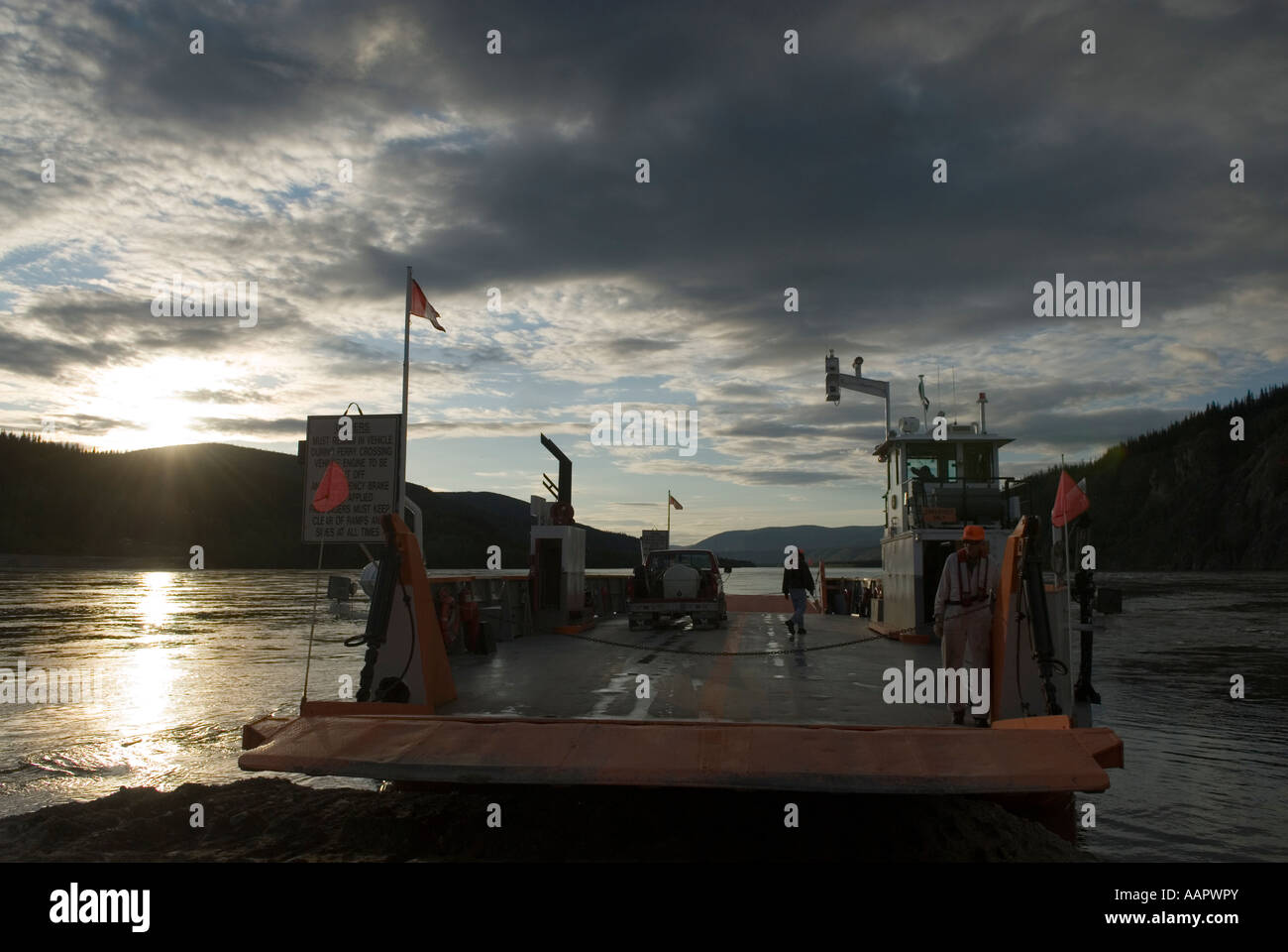 Ferry crossing the Yukon River at Dawson City Yukon Canada Stock Photo ...