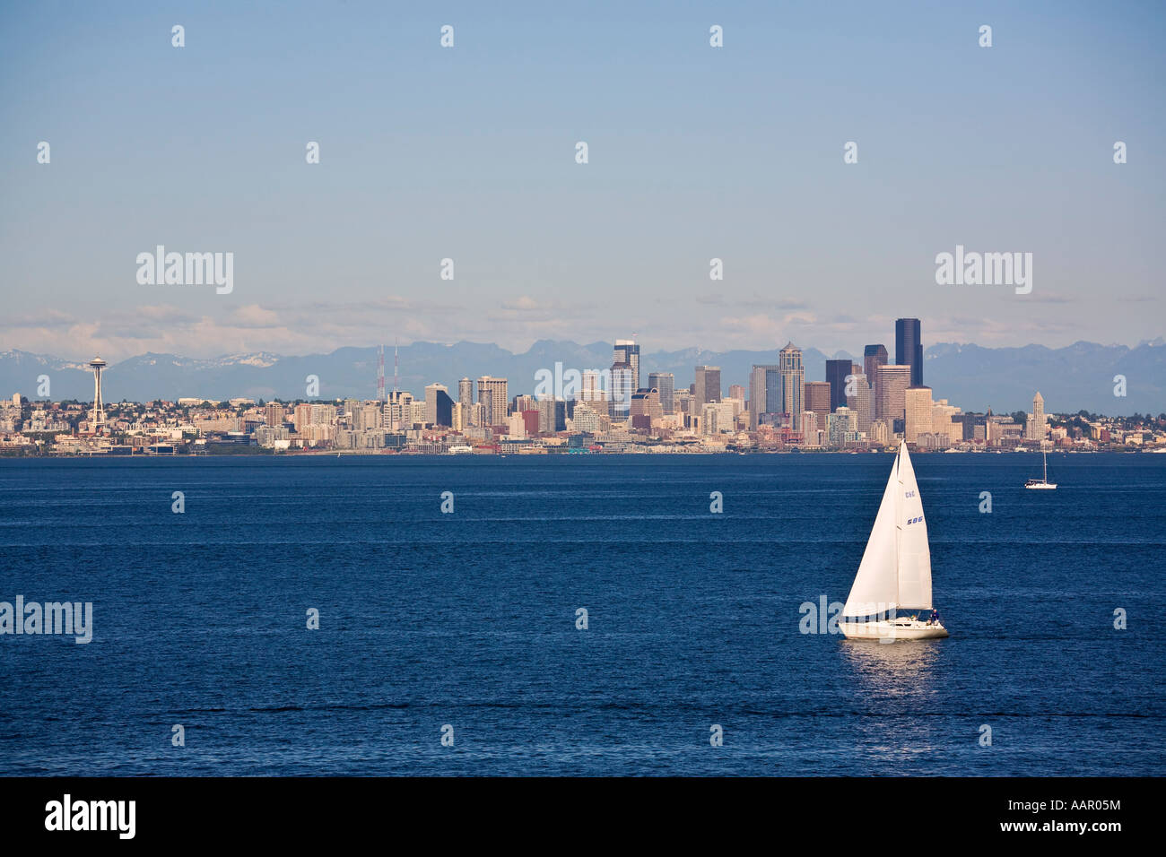Sailboat on Puget Sound with Seattle WA skyline in distance Stock Photo ...