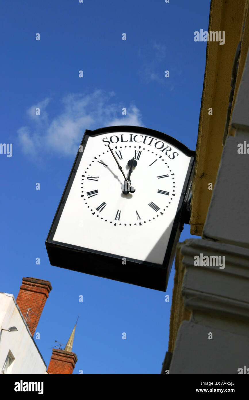 clock outside solicitors office in Malvern UK Stock Photo - Alamy
