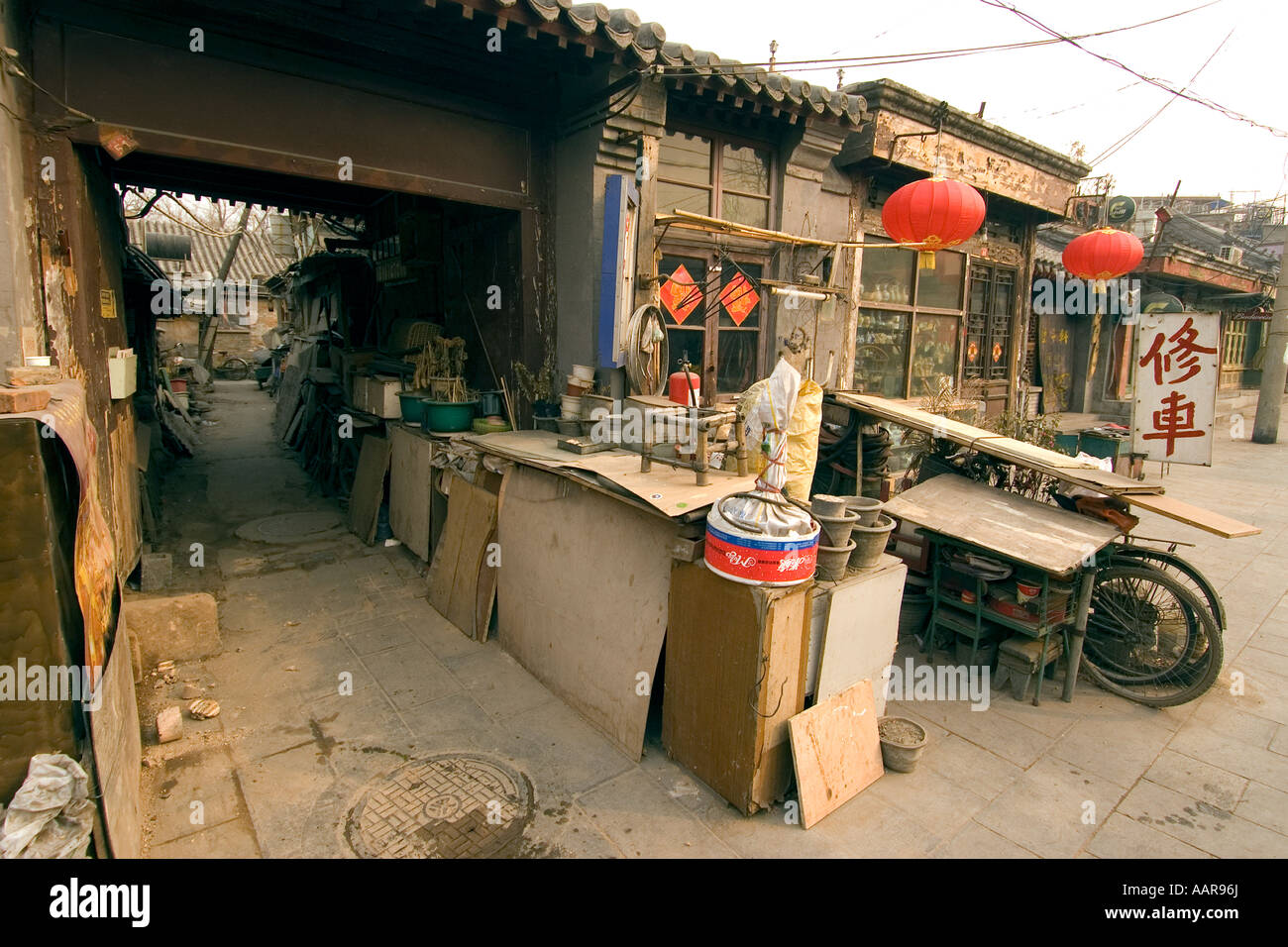 A hutong traditional chinese alleys with shared courtyards and tiny ...