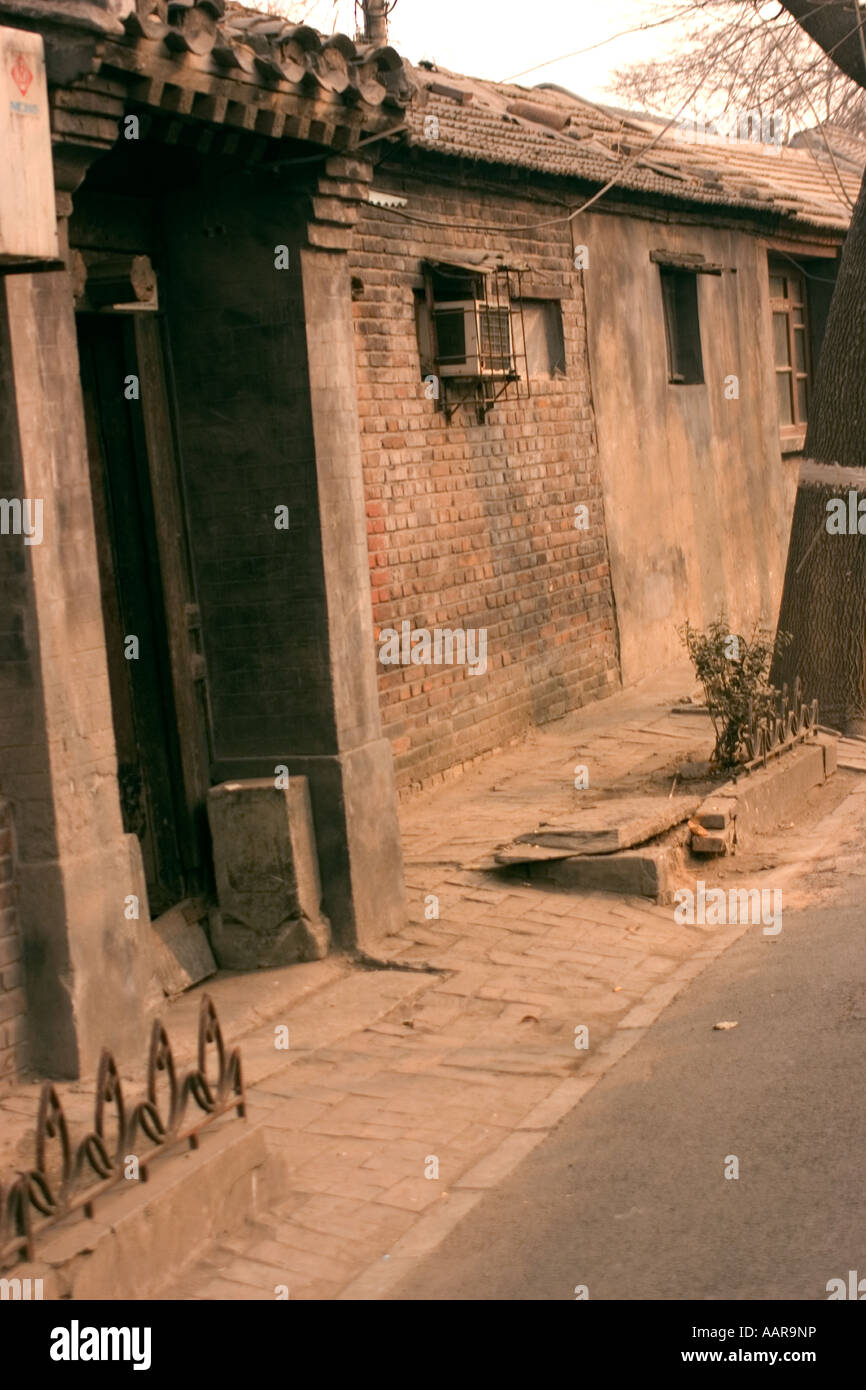 Entrance to a hutong traditional chinese alleys and homes with shared ...