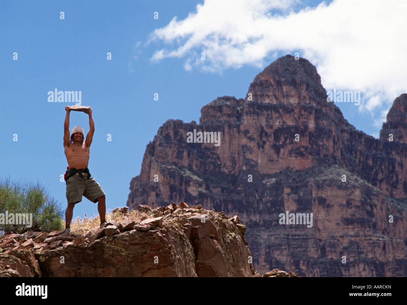 Matt Allen throws a rock off the TONTO PLATEAU near SHINUMO CREEK GRAND ...