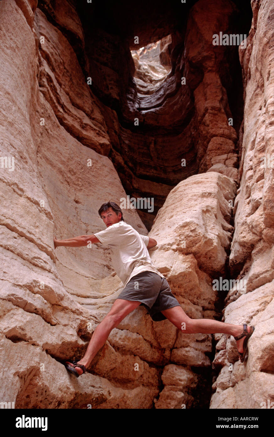 Tim climbs YONI ROCK FORMATION formed from side drainage of DEER CREEK ...
