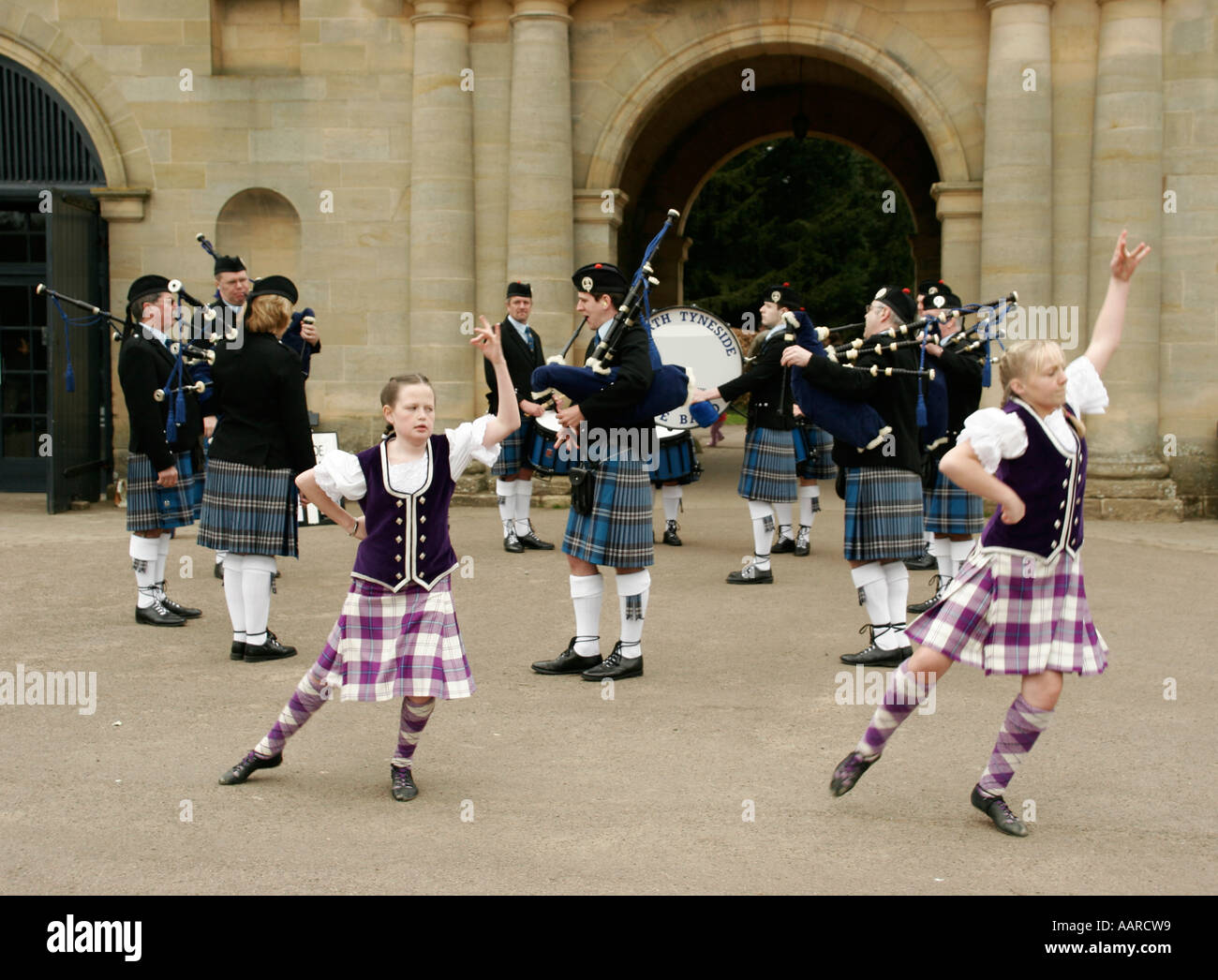 Highland dancers with pipe band Stock Photo - Alamy