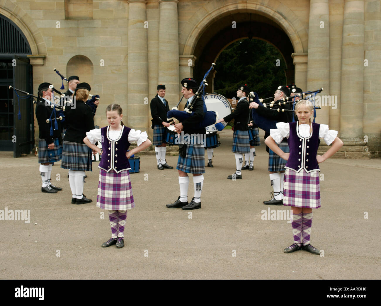 Highland dancers with pipe band Stock Photo - Alamy
