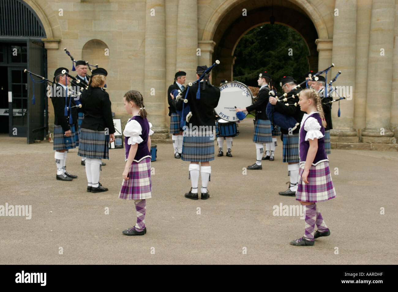 Highland dancers with pipe band Stock Photo - Alamy