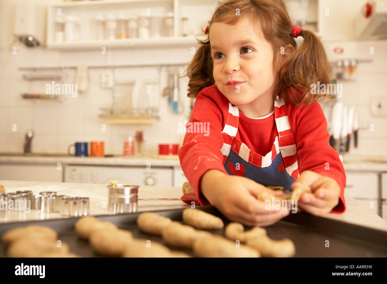 Girl in Kitchen Stock Photo - Alamy