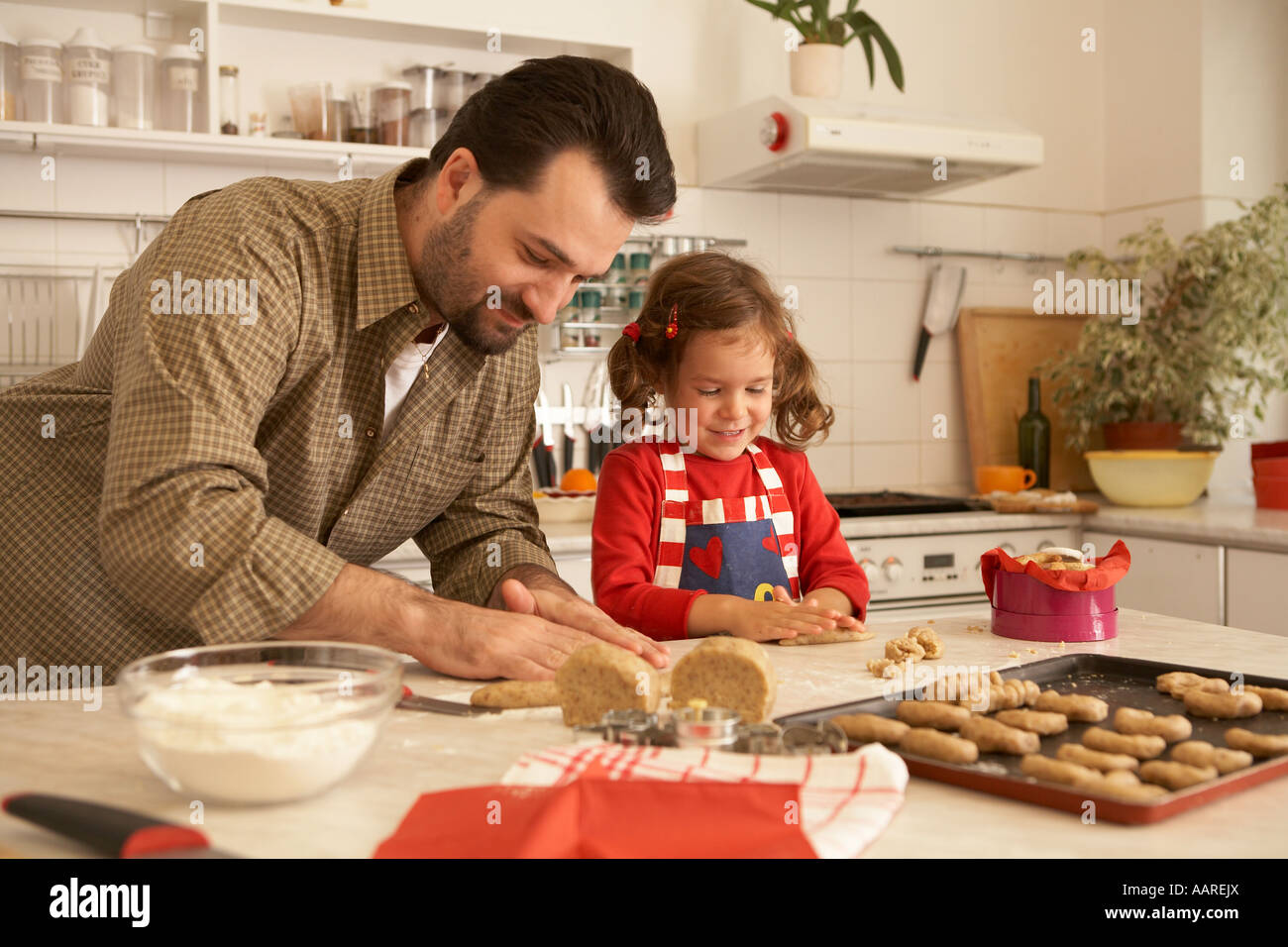 Girl in Kitchen Stock Photo - Alamy