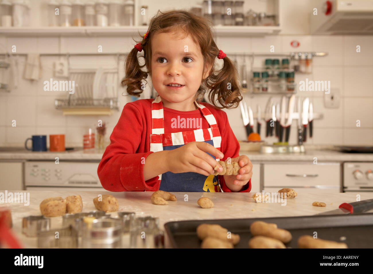 Girl in Kitchen Stock Photo - Alamy