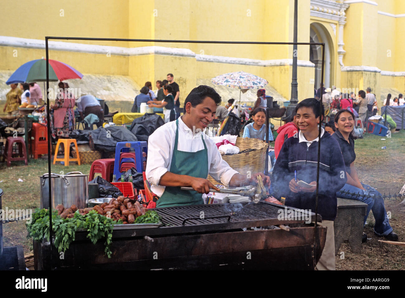 Man selling meat Antigua city Guatemala Stock Photo - Alamy