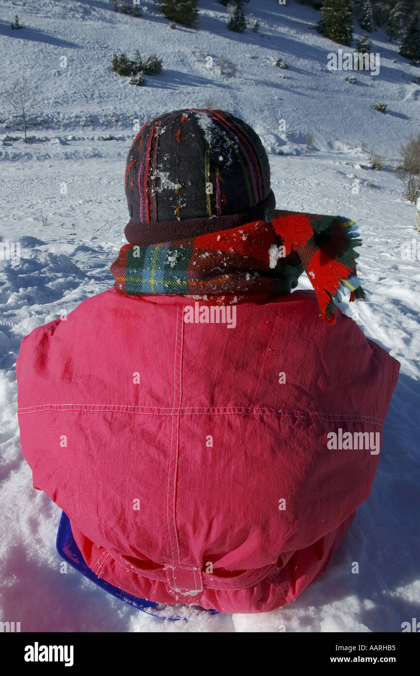 Children sledging down hill hi-res stock photography and images - Alamy