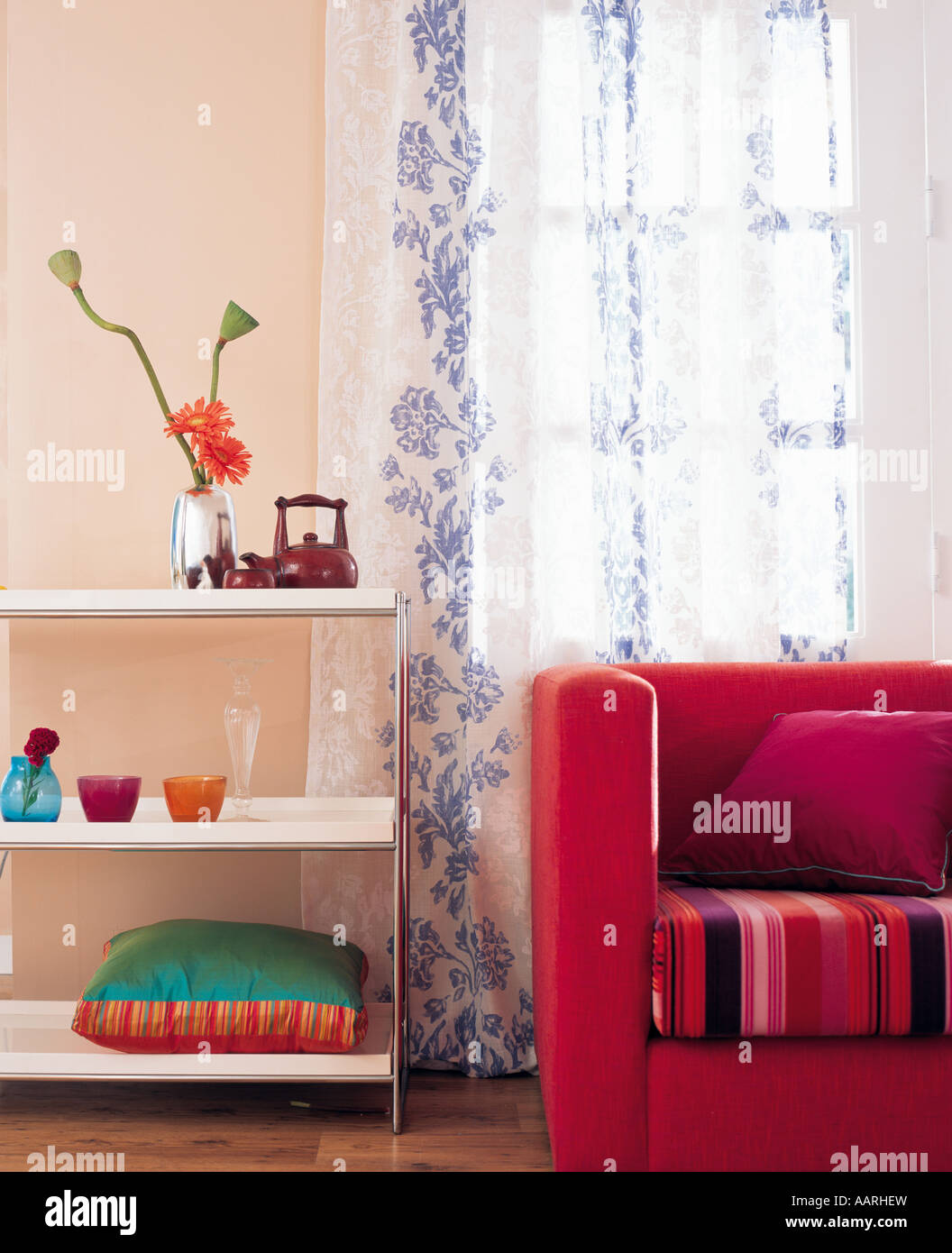 Sofa and display shelf Stock Photo - Alamy