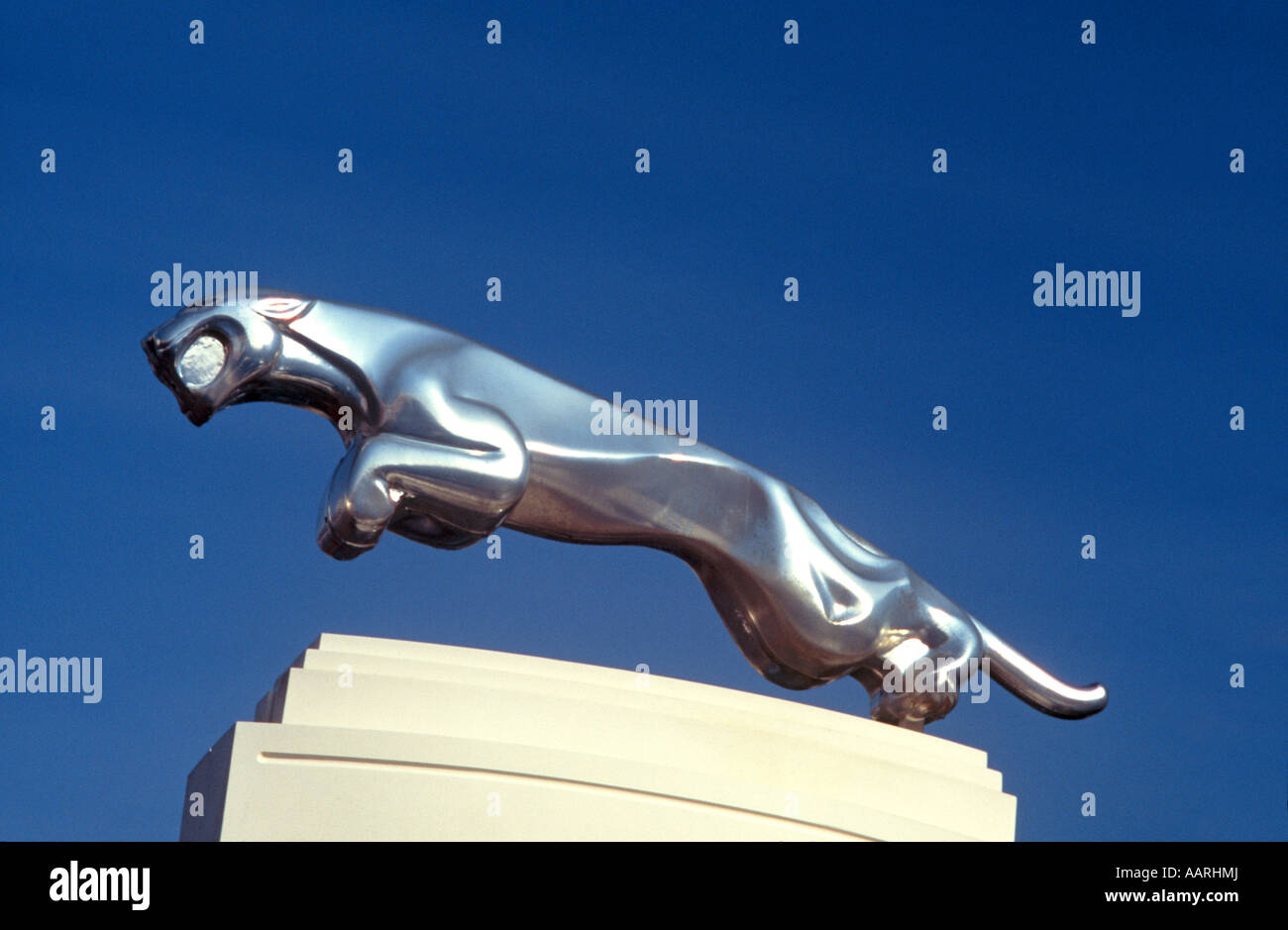 Leaping cat symbol outside Jaguar dealership Stock Photo - Alamy