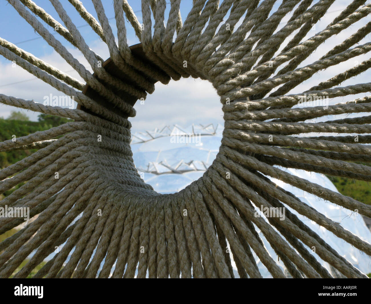 Rope fence woven around shaped metal at the Eden Project Cornwall ...