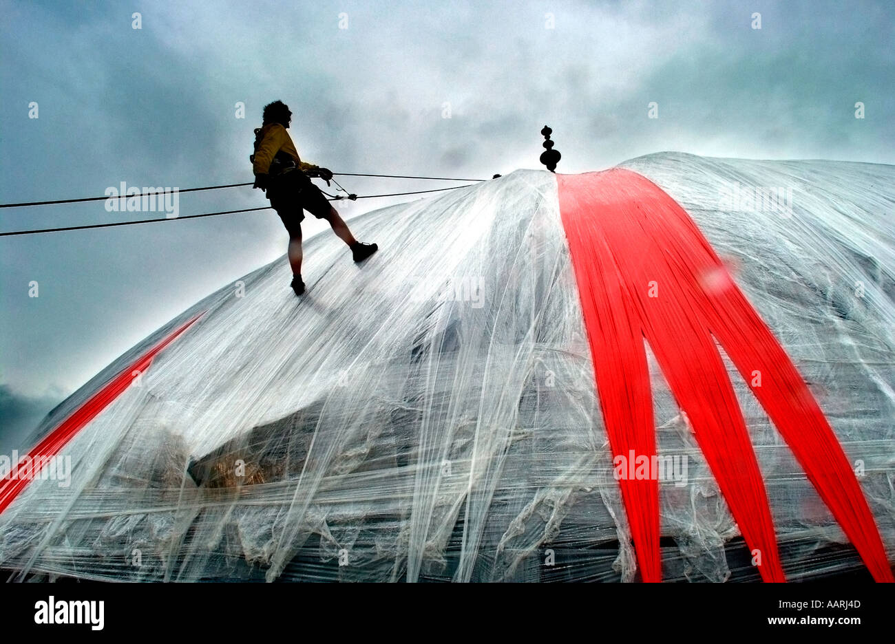 Wacky artist wraps historic building in clingfilm Stock Photo - Alamy