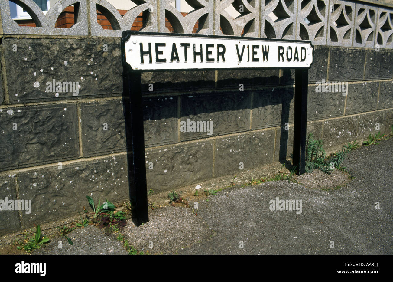 Recently repainted cast iron road name sign Stock Photo - Alamy