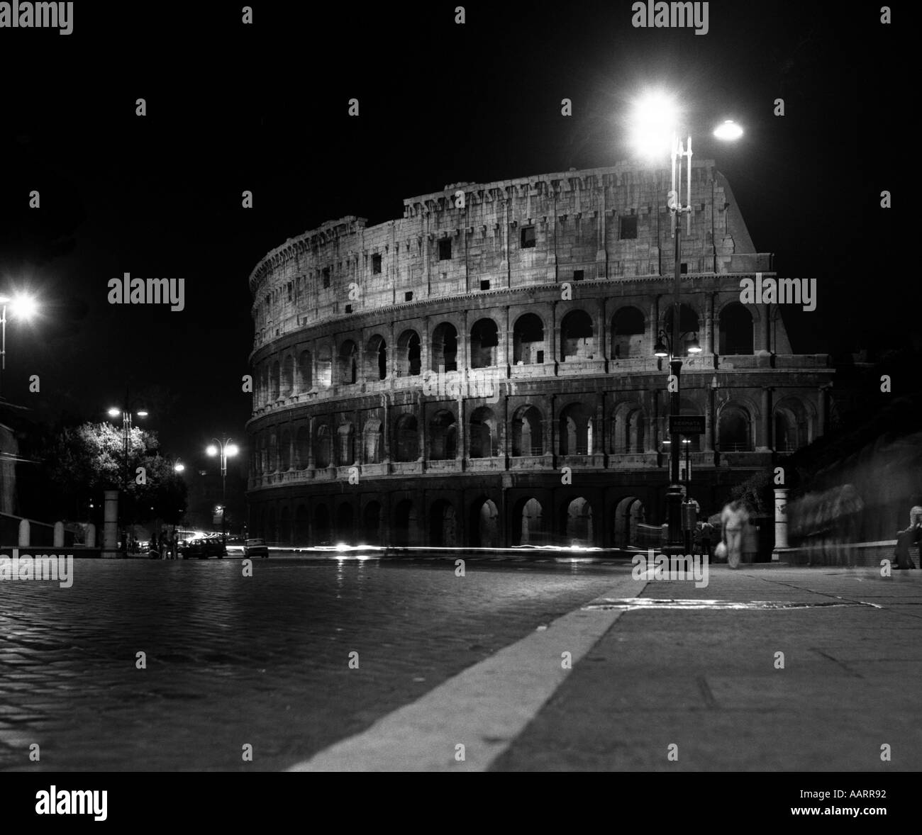 The Coliseum in Rome by night Stock Photo - Alamy