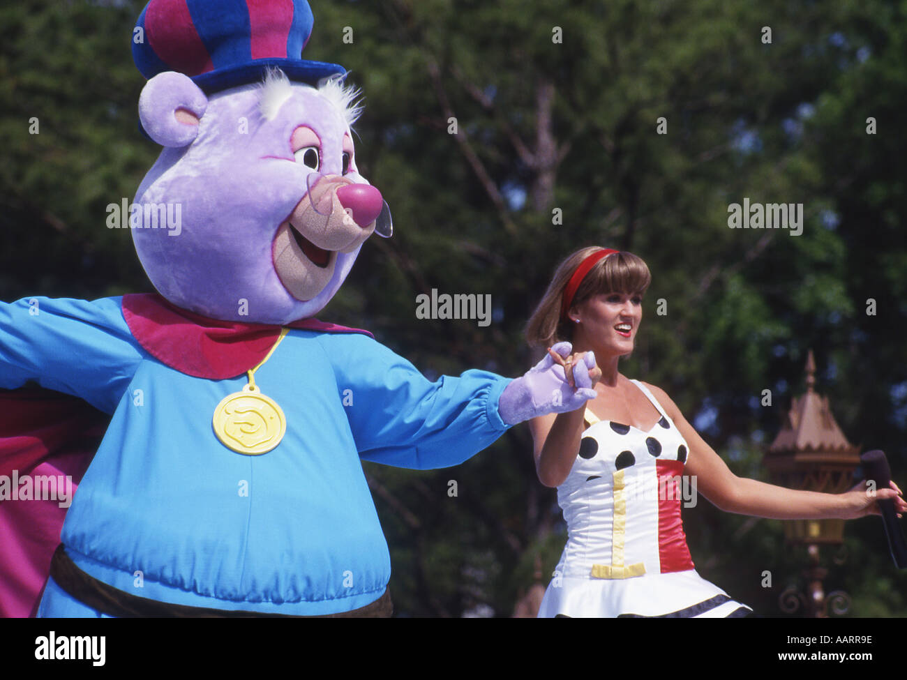Part of a dance routine in an outdoor show at Disney Magic Kingdom in ...