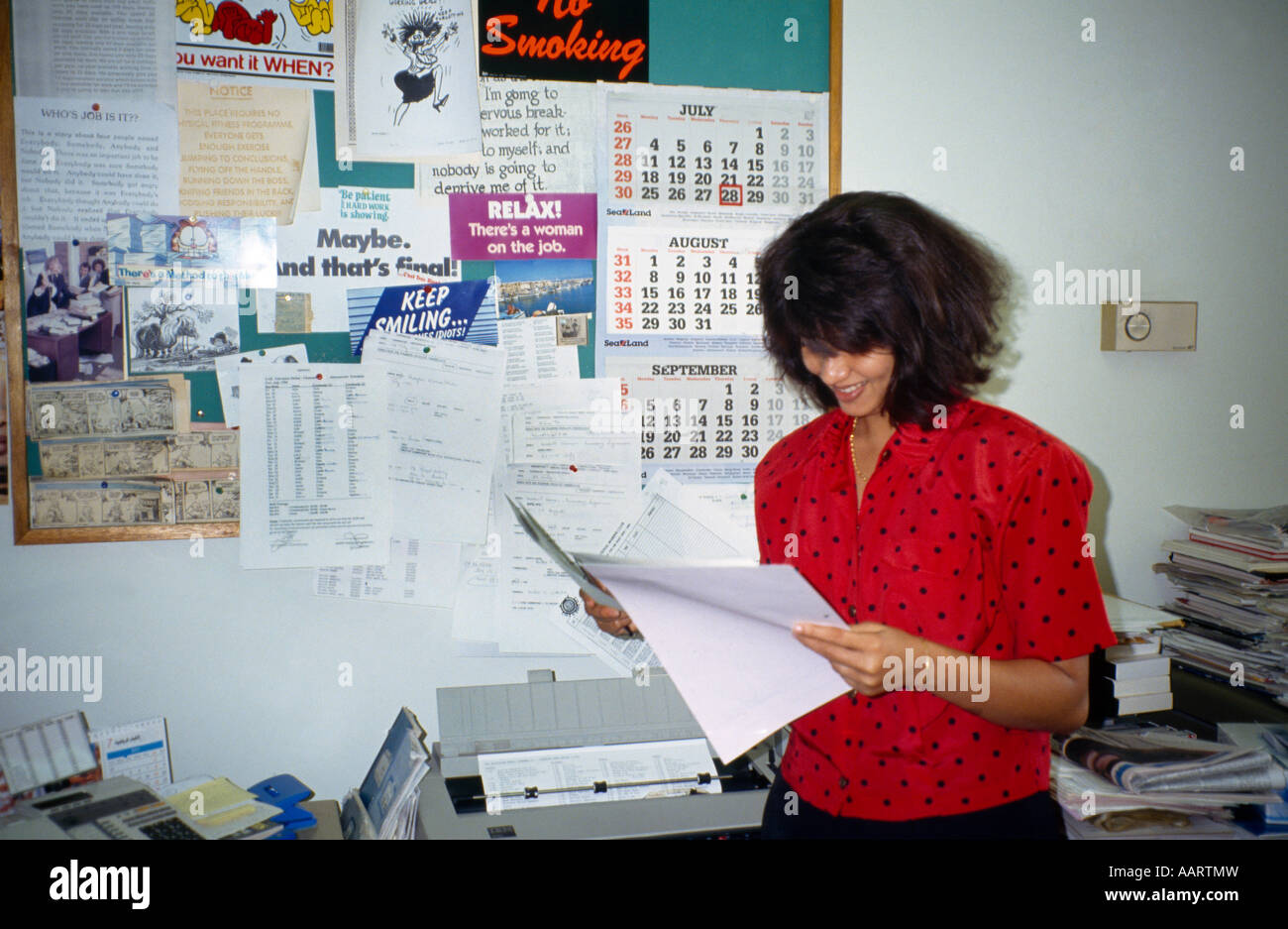 Dubai UAE Woman Working In Office Stock Photo - Alamy