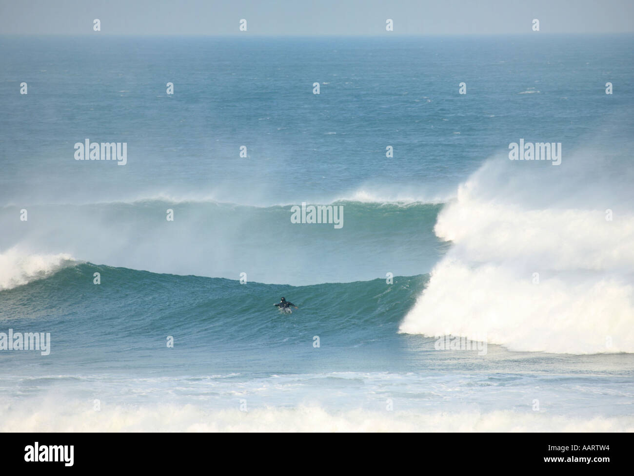 Surfer paddling out hi-res stock photography and images - Alamy