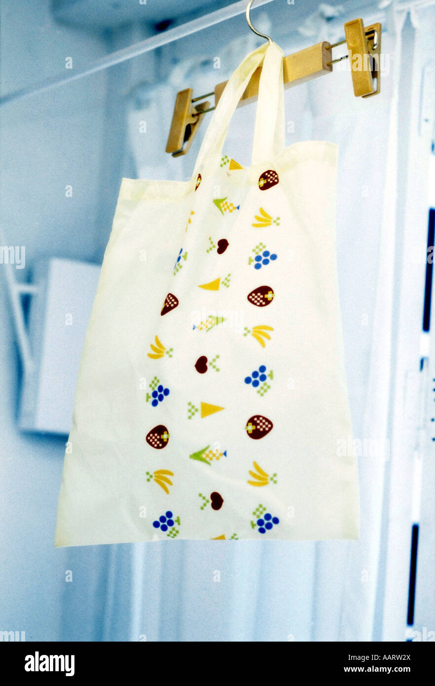 The shopping bag hung in a coat hanger Stock Photo - Alamy