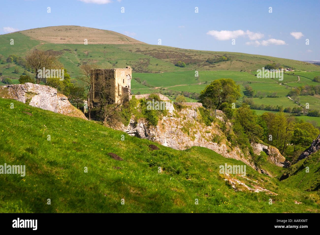 View of the Keep at Peveril Castle above CaveDale at Castleton in the ...