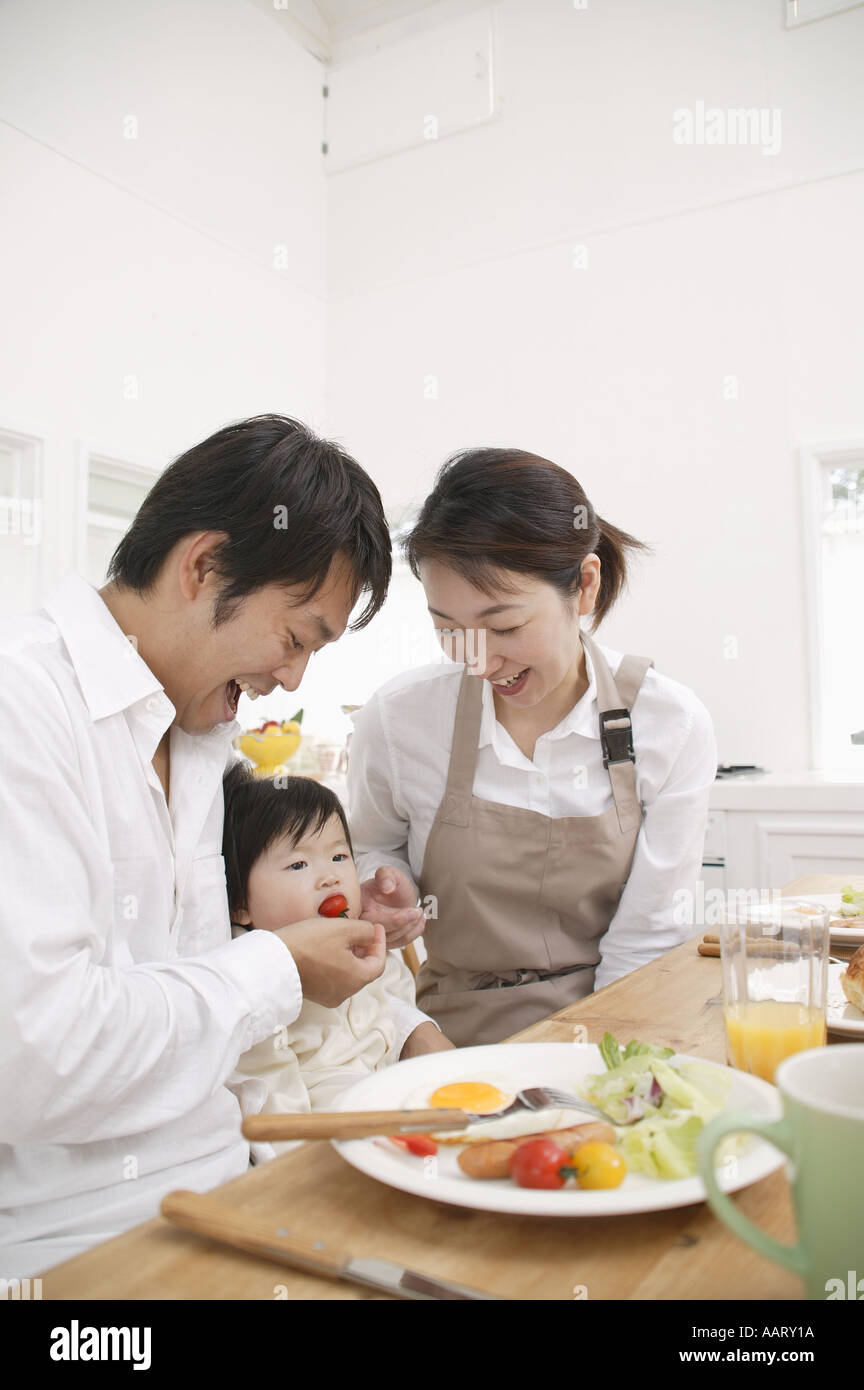 Family eating breakfast Stock Photo - Alamy