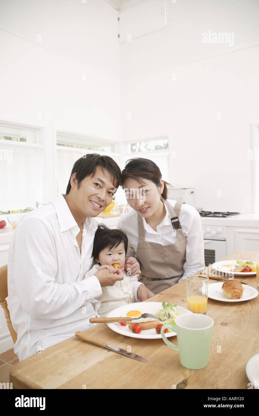 Family eating breakfast Stock Photo - Alamy