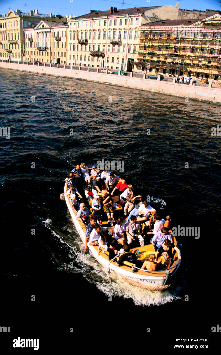 ST PETERSBURG MOSCOW TOURISTS TAKE A BOAT TRIP ALONG THE NEVA RIVER ST ...
