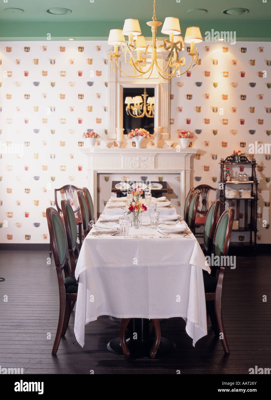 Pattern wallpaper and formal dinner setting Stock Photo - Alamy