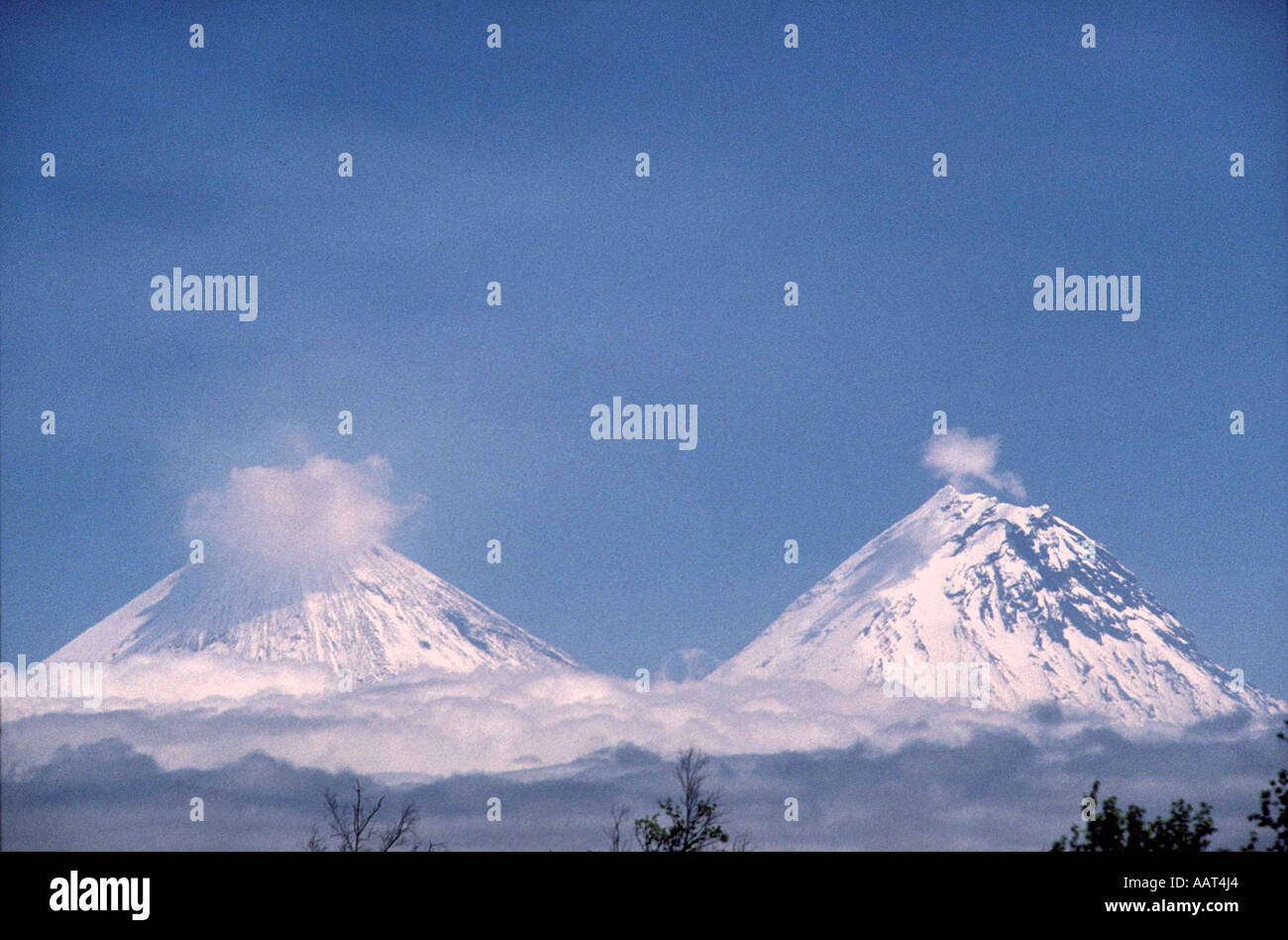 Two active volcanoes in Kamchatka Stock Photo - Alamy