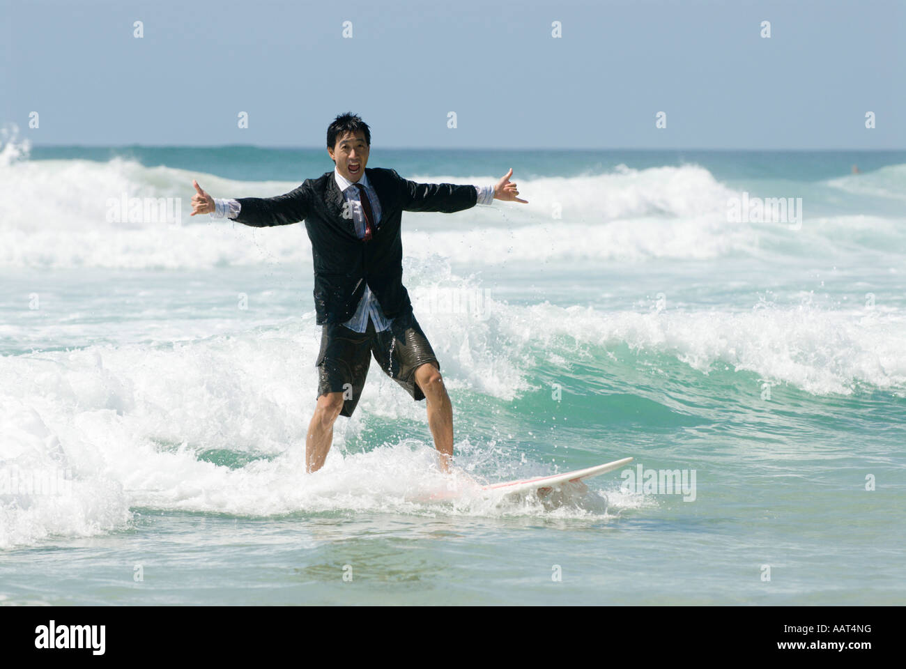 Businessman beach ocean surf water suit hi-res stock photography and ...