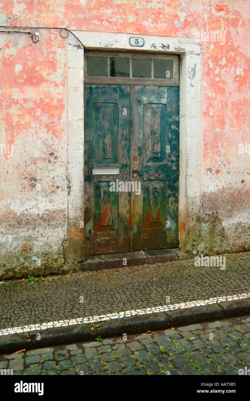 A rustic door in a residential neighborhood in the Azores Stock Photo ...