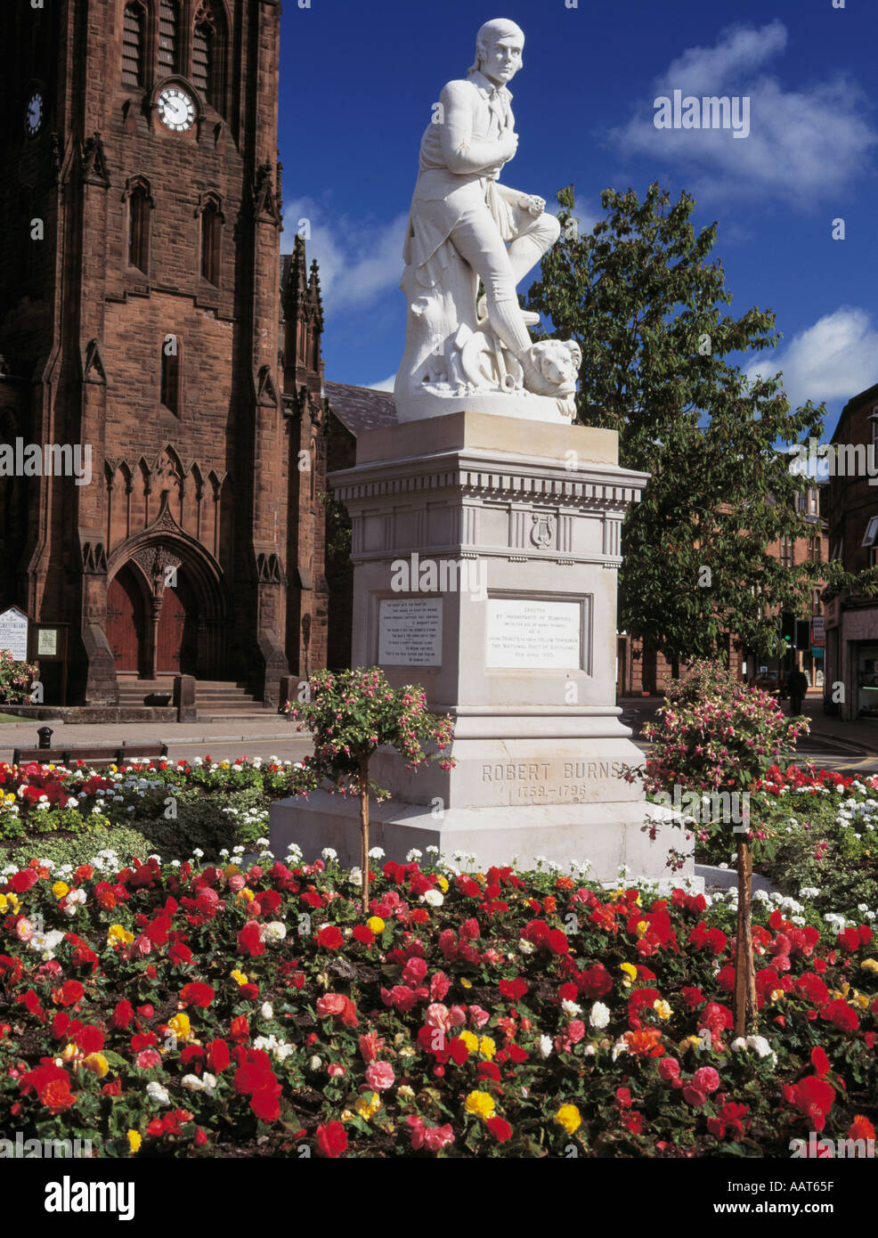 Summer colour at Robert Burns statue Dumfries town centre with Grey ...