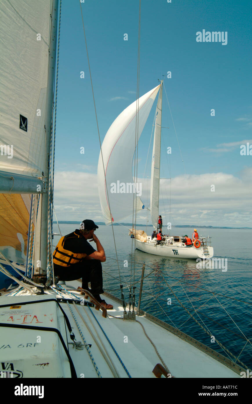 A racing sailboat drifting along in almost no wind Stock Photo - Alamy