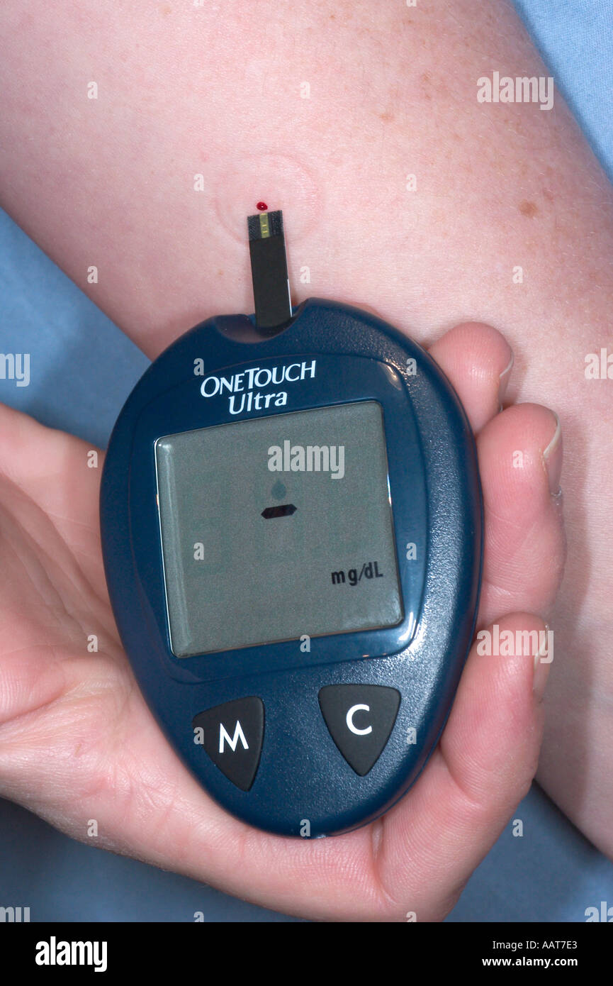 glucometer device for measuring blood sugar glucose in diabetics Stock ...