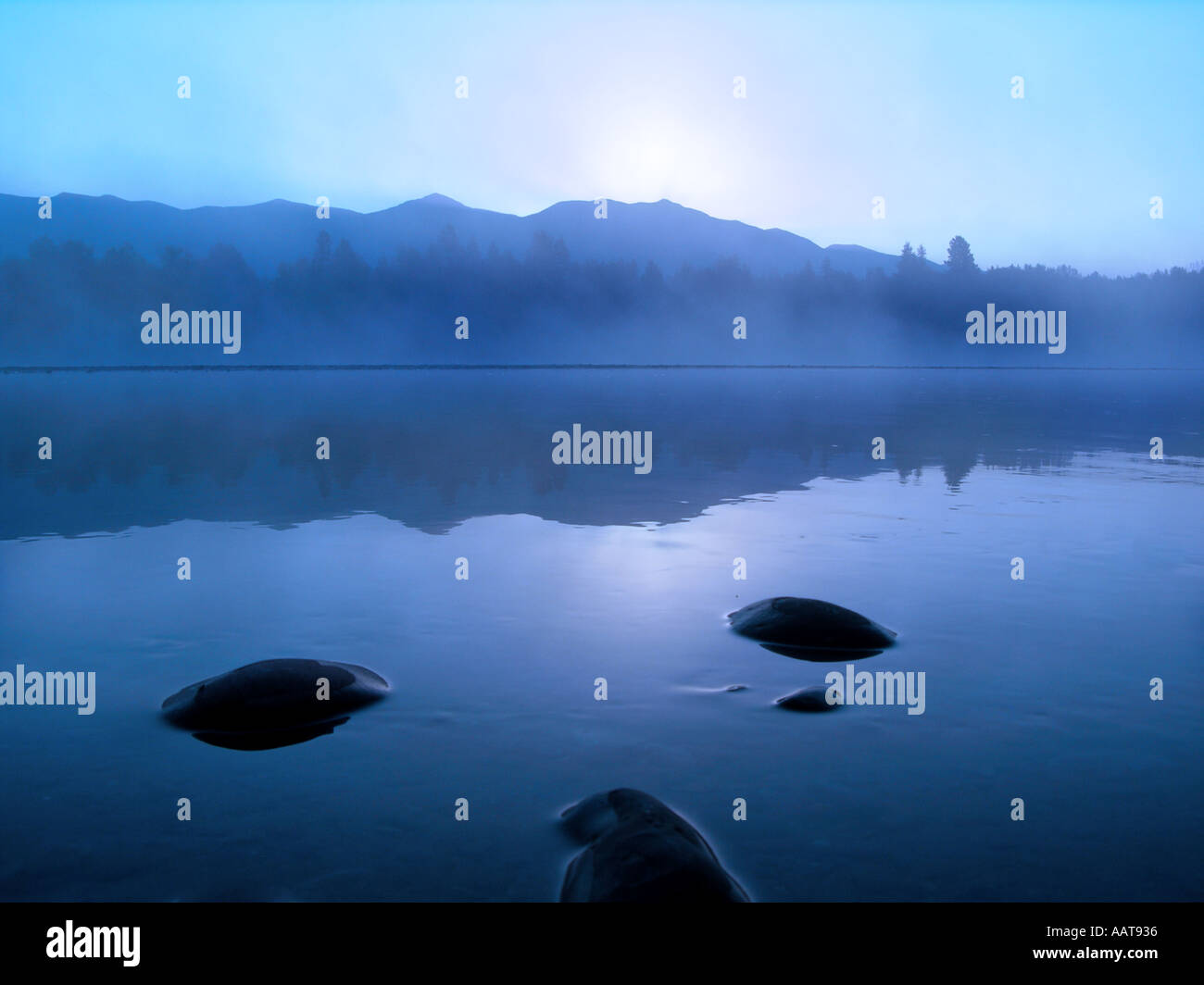 Blue misty river landscape Stock Photo - Alamy