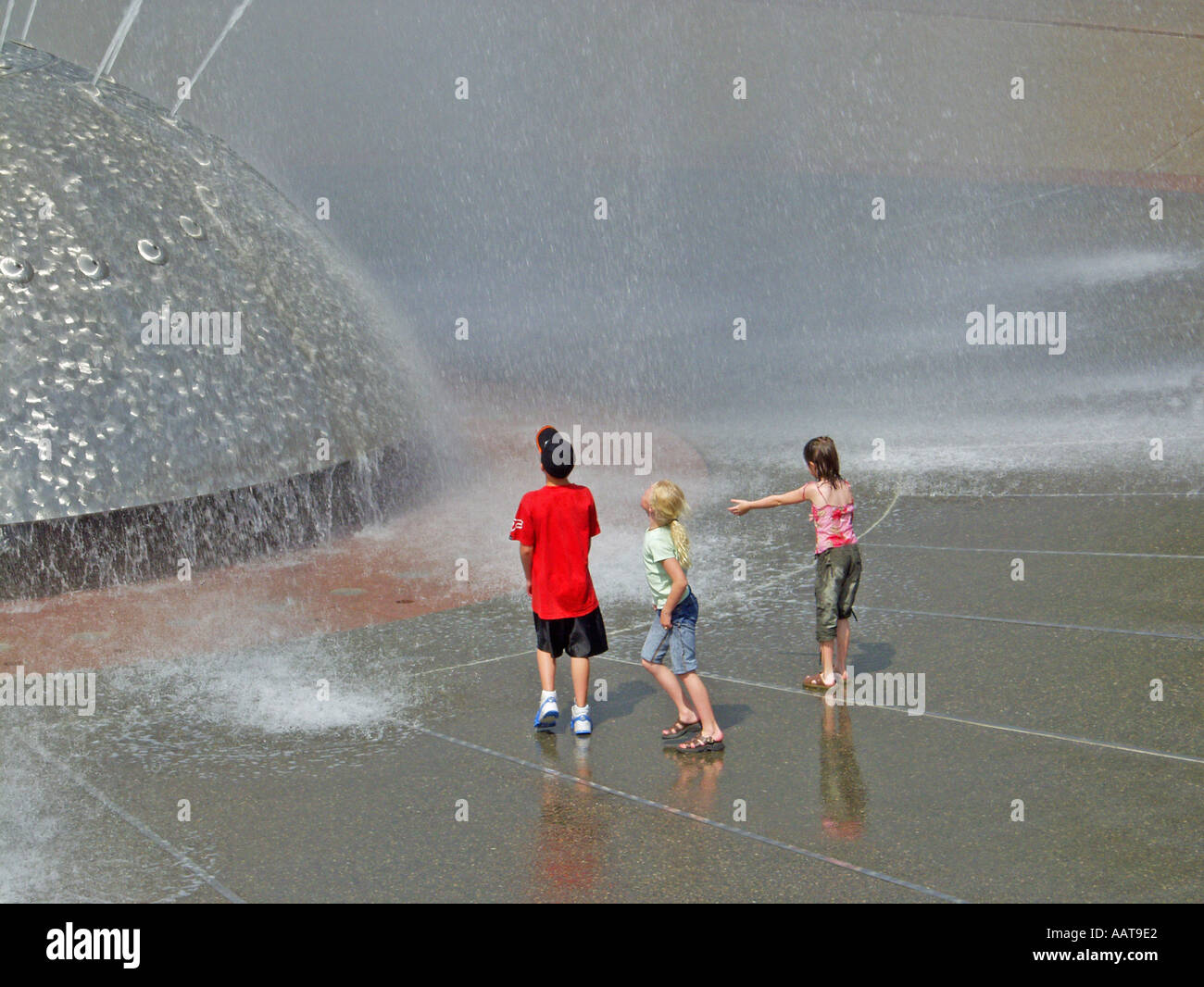 Girls Cooling Off In Fountain High Resolution Stock Photography and ...