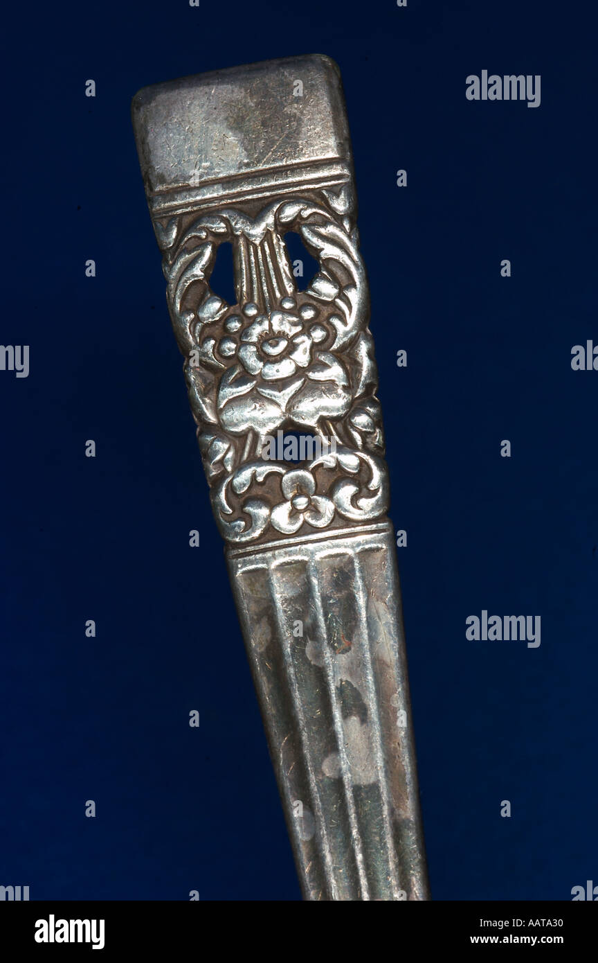 tarnished silver spoon handle Stock Photo - Alamy