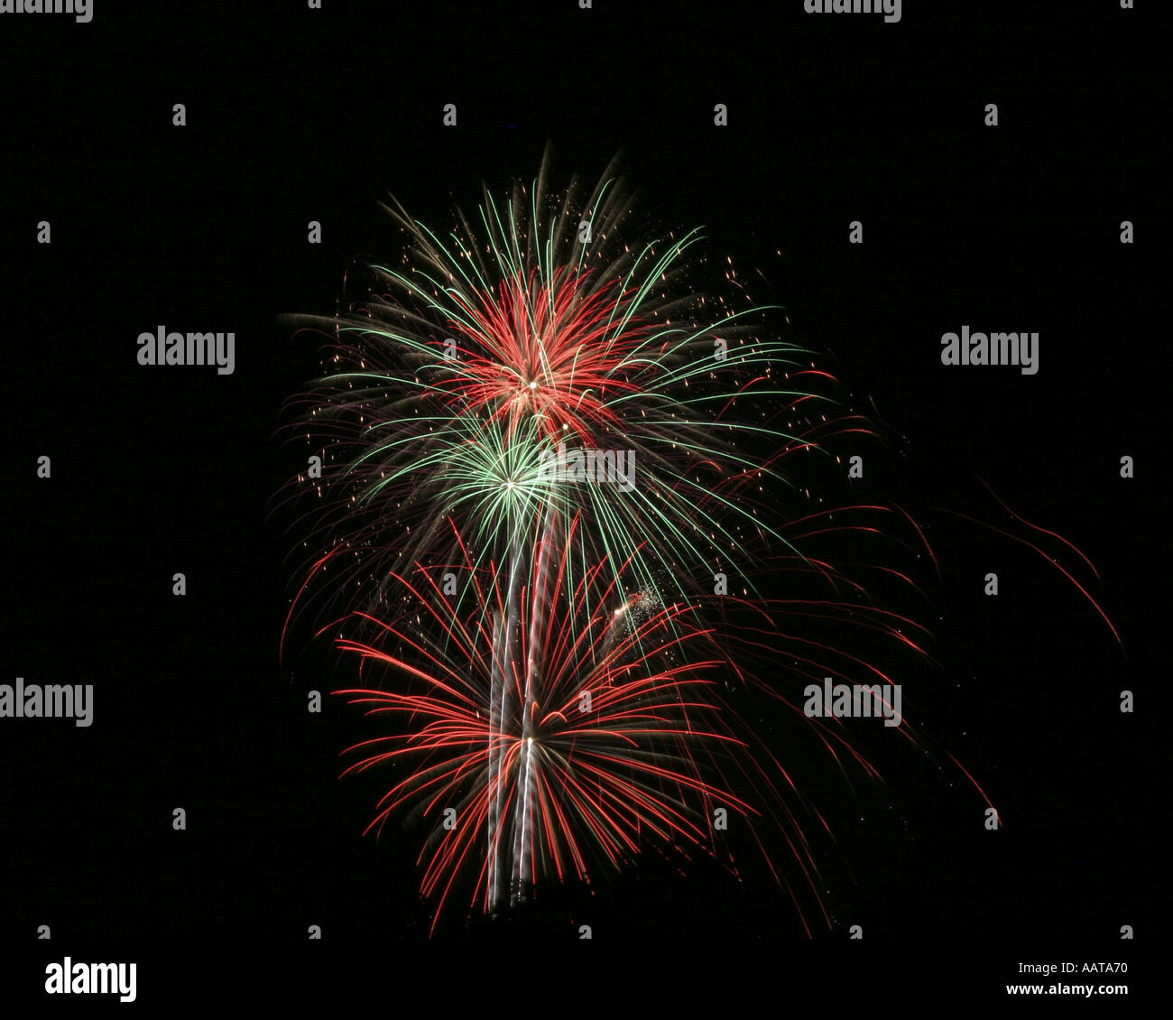 Fireworks bursting in the night sky Stock Photo - Alamy