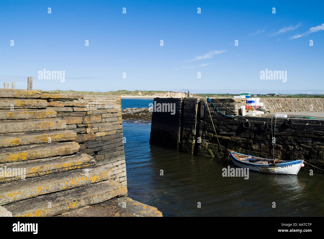 dh Castletown harbour CASTLETOWN CAITHNESS Fishing boat alongside ...