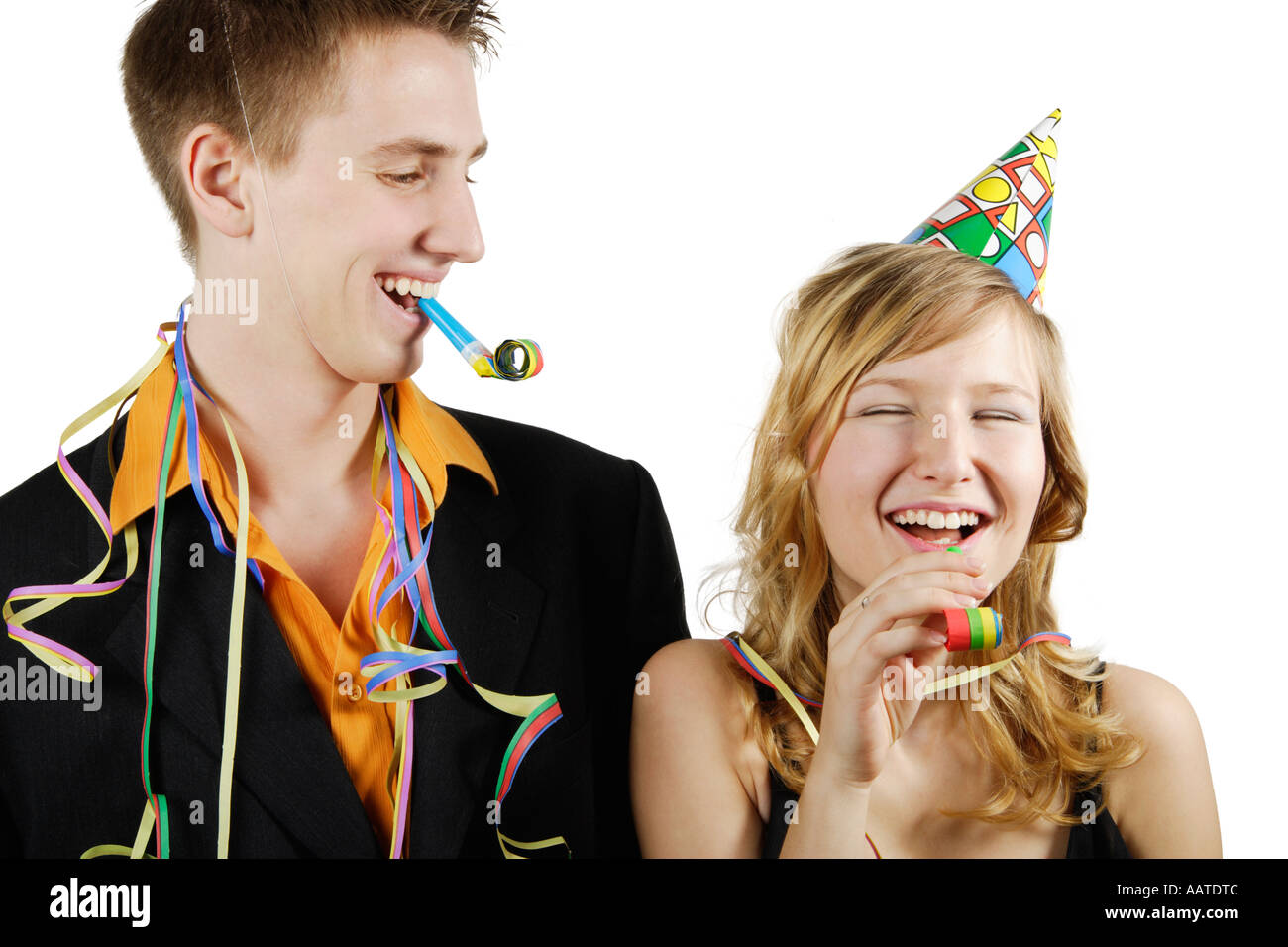 Young couple having fun at a party Stock Photo - Alamy
