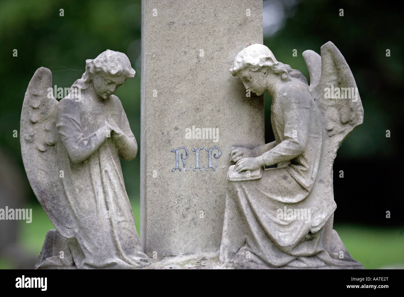 Angel at the base of cross hi-res stock photography and images - Alamy