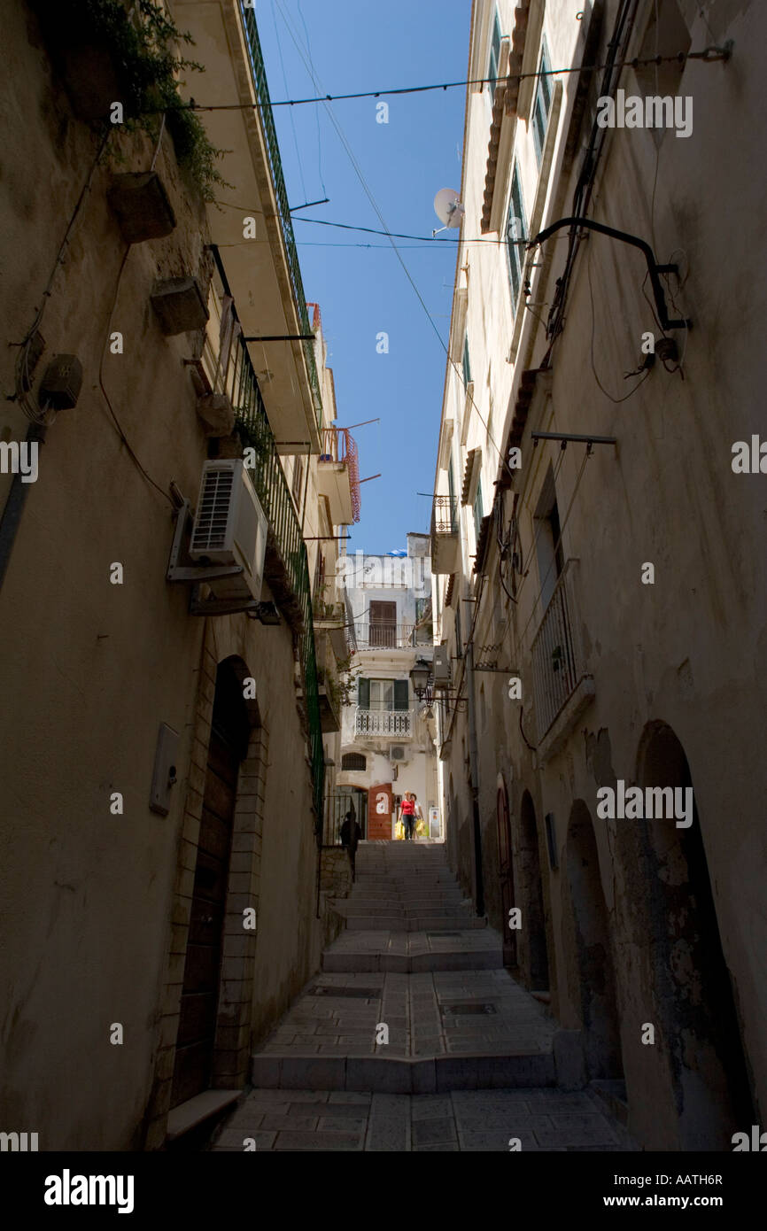 Narrow street and steps in Vieste, Gargano, Puglia, Italy Stock Photo ...