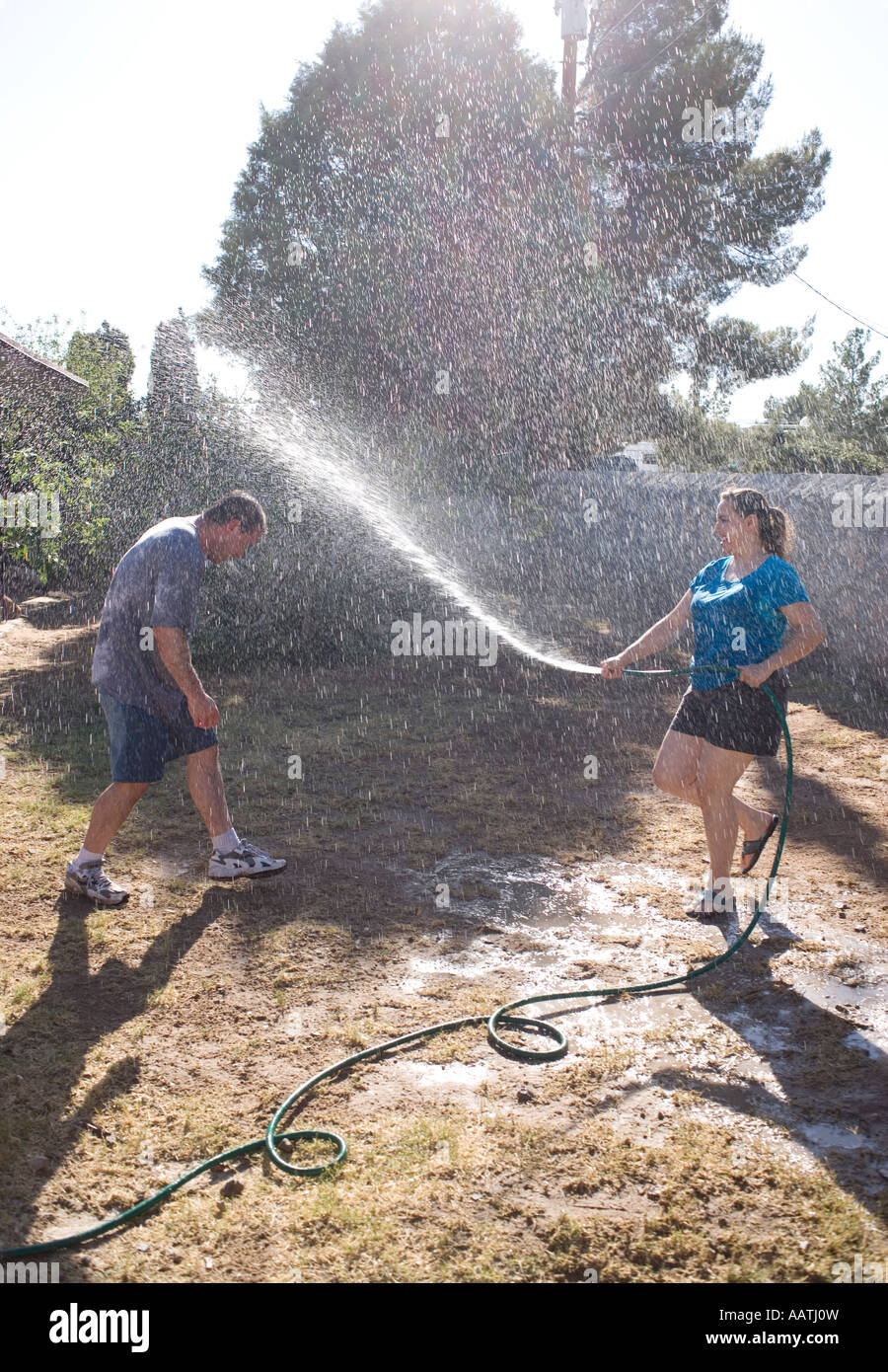 Water fight hi-res stock photography and images - Alamy