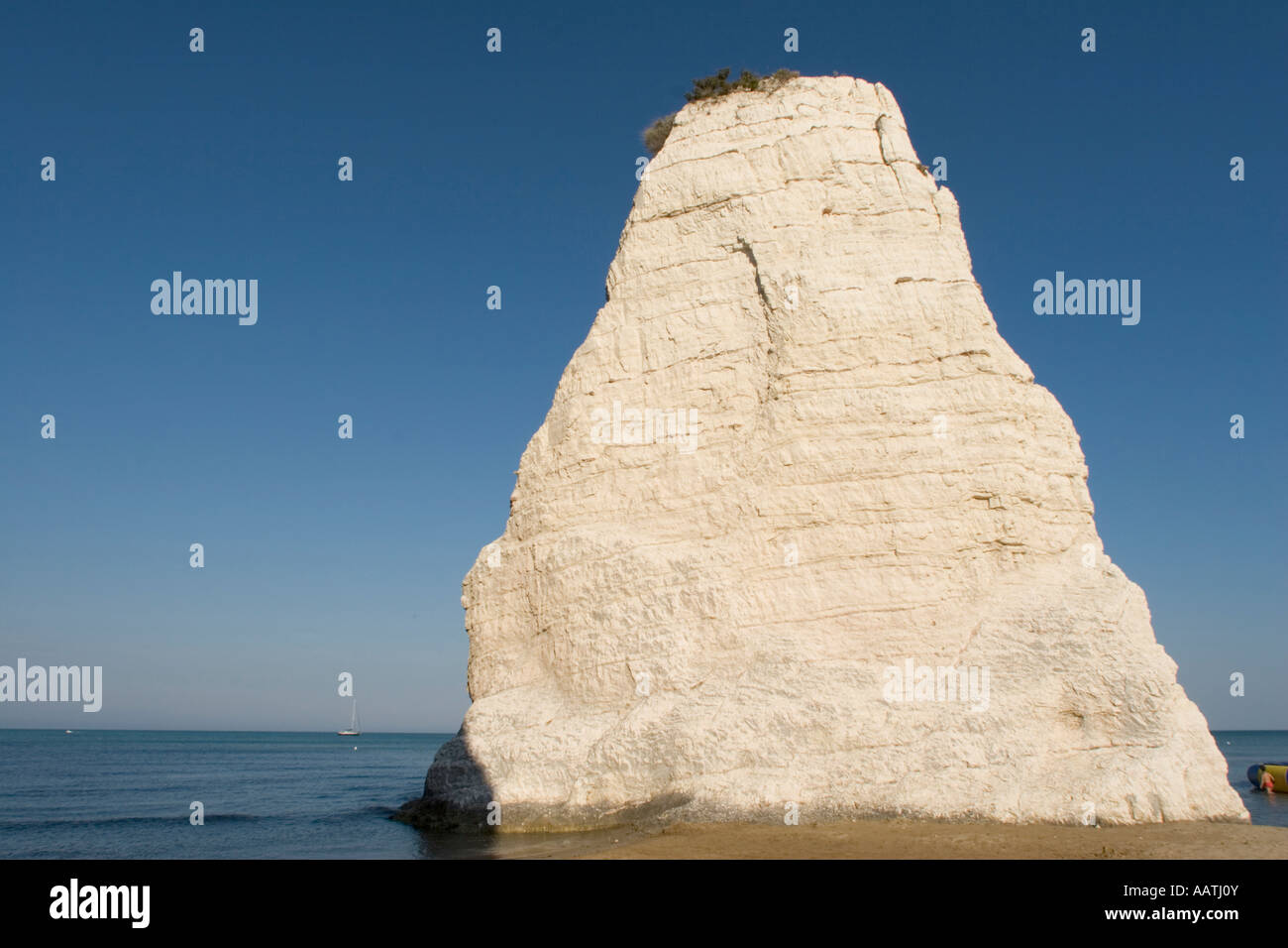 The white rock known as Pizzomunno or Faraglione di Vieste, Gargano ...