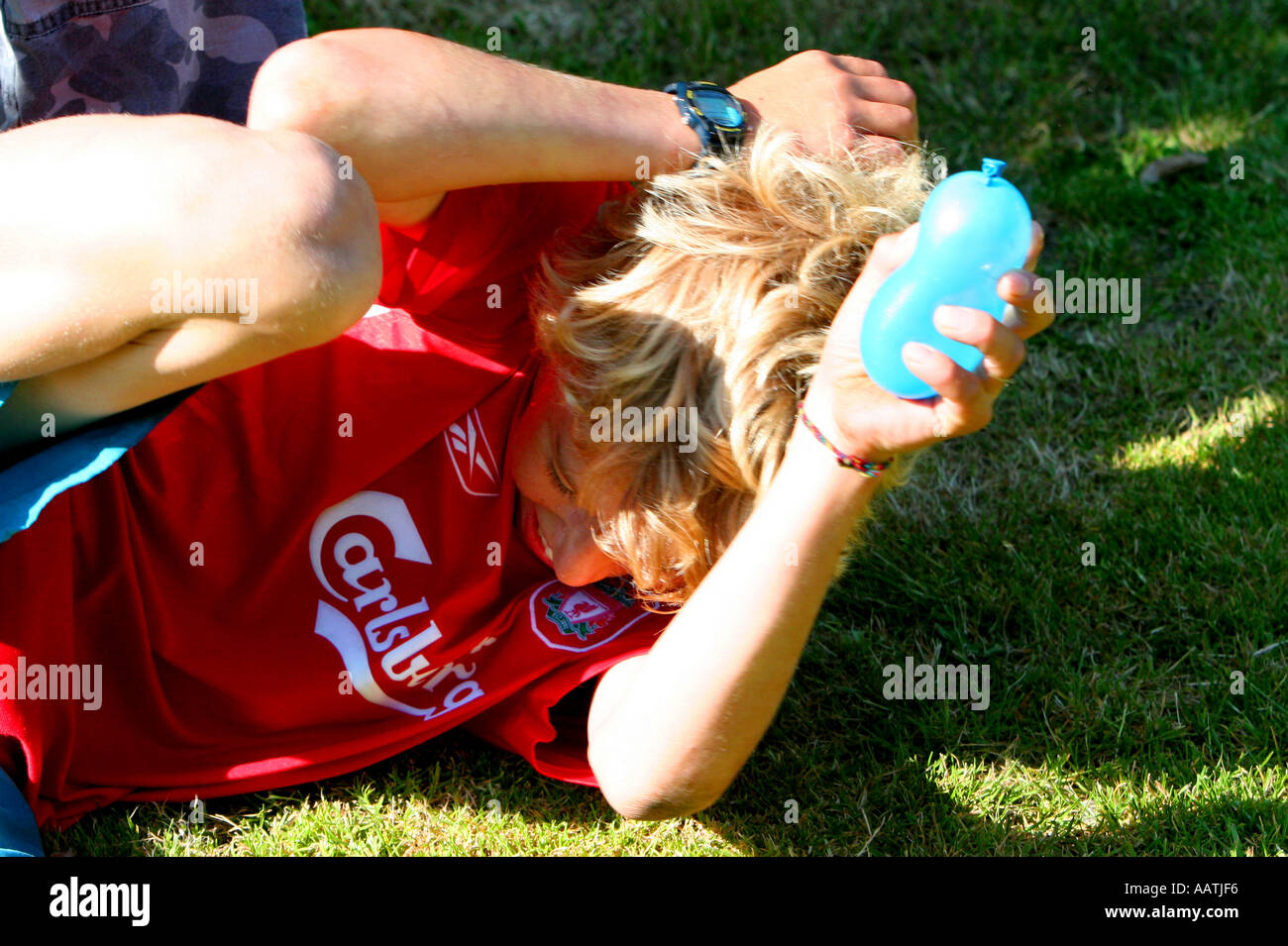 boy and water bombs Stock Photo - Alamy