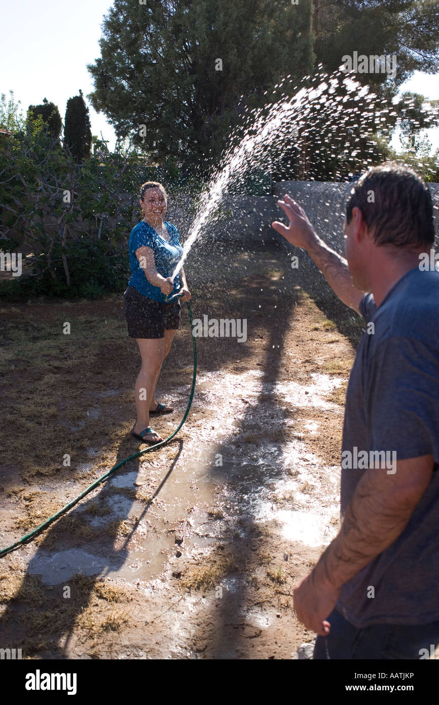 Water fight couple hi-res stock photography and images - Alamy