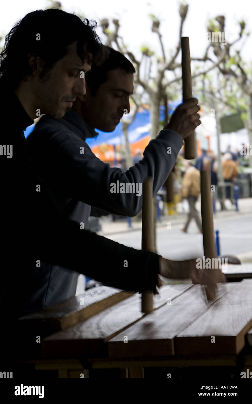 Two Basque men playing the Txalaparta, a Basque traditional percussion ...